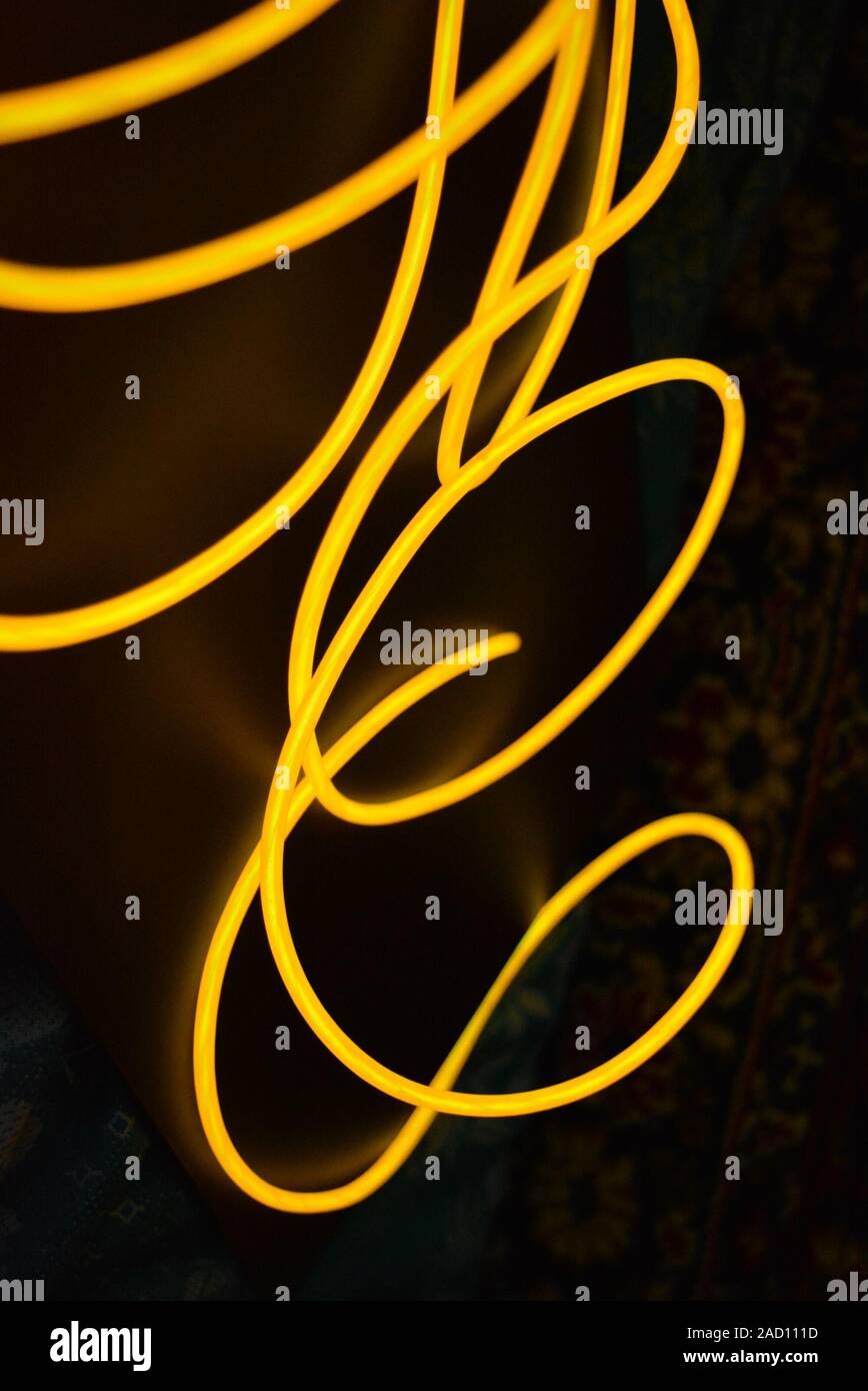 Bright orange luminous wire, twisted light wire, cable. Different ...