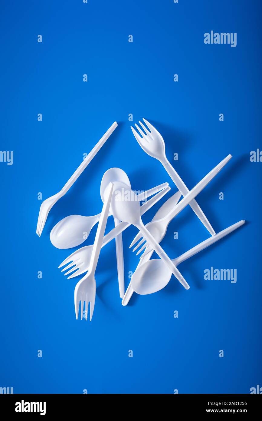 single use plastic forks, spoons. concept of recycling plastic, plastic ... single use plastic forks, spoons. concept of recycling plastic, plastic ...