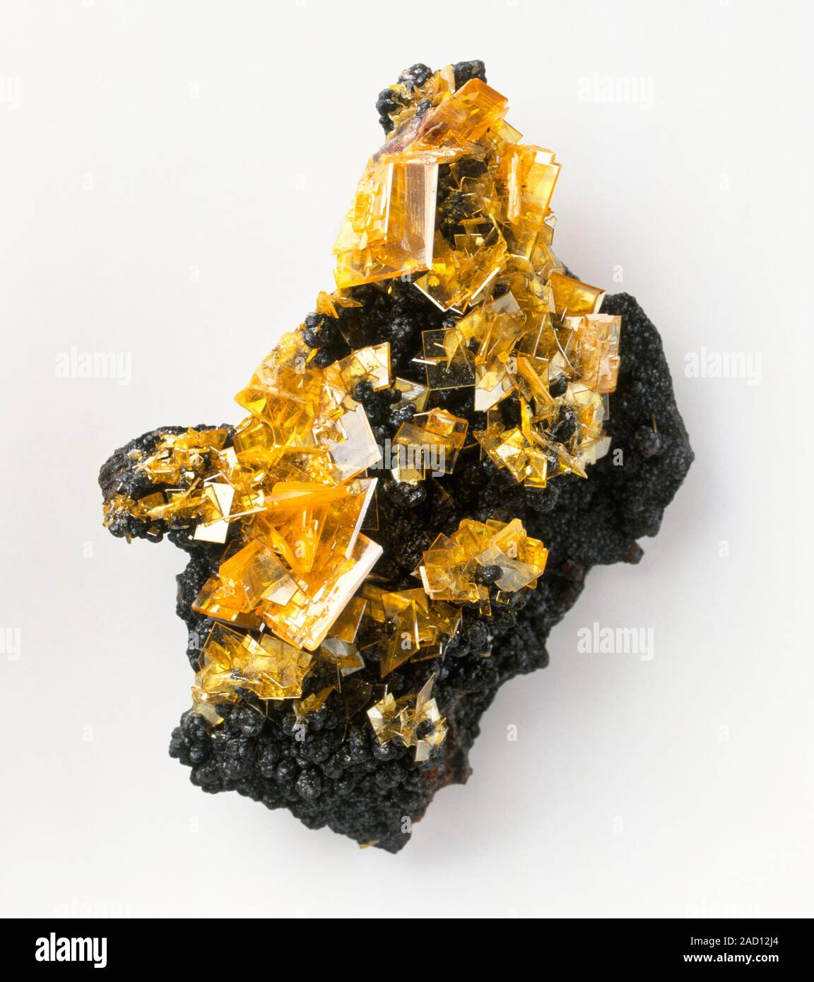 Wulfenite crystals in dark groundmass, close-up Stock Photo - Alamy