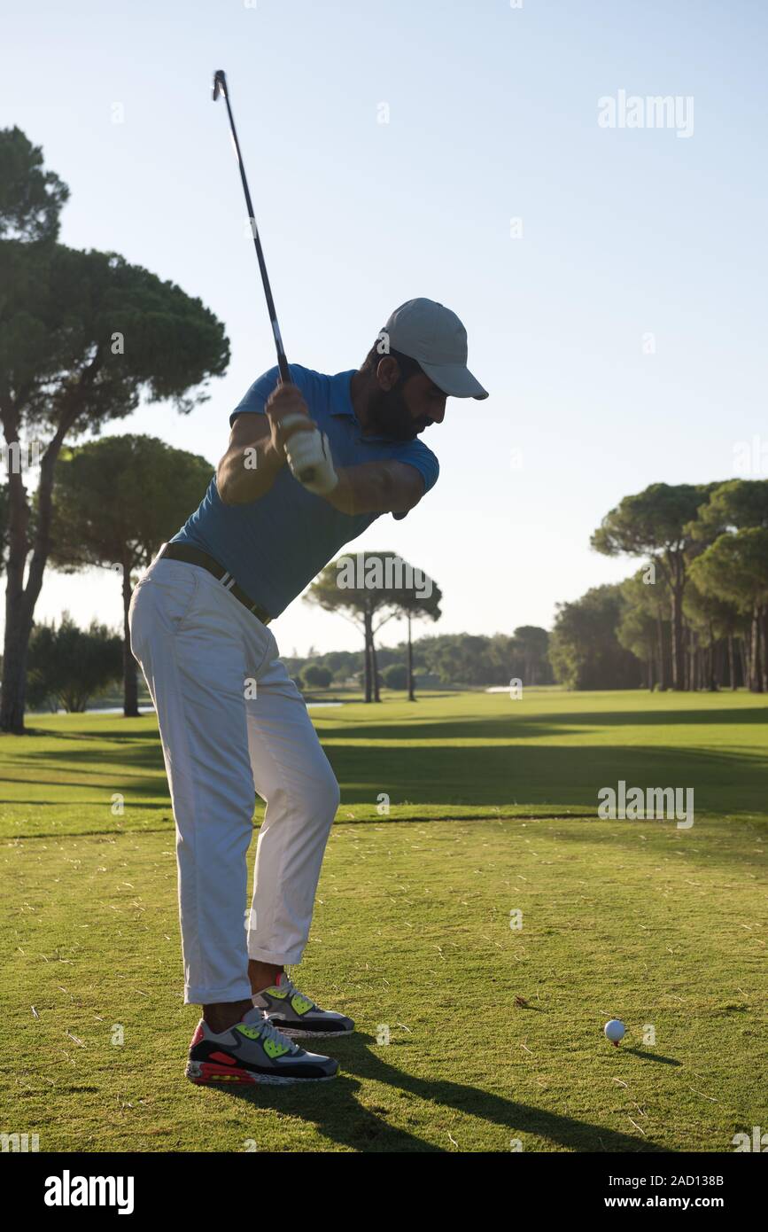 golf player hitting shot Stock Photo - Alamy