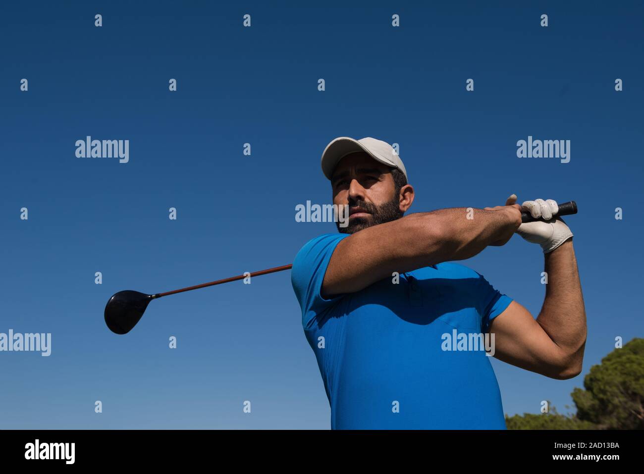 golf player hitting shot Stock Photo - Alamy