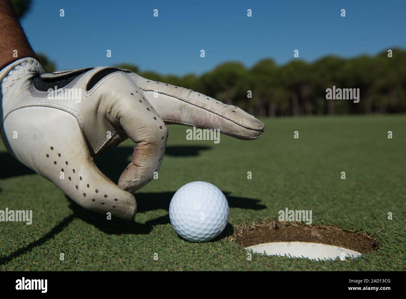 Putting hand up sports hi-res stock photography and images - Alamy