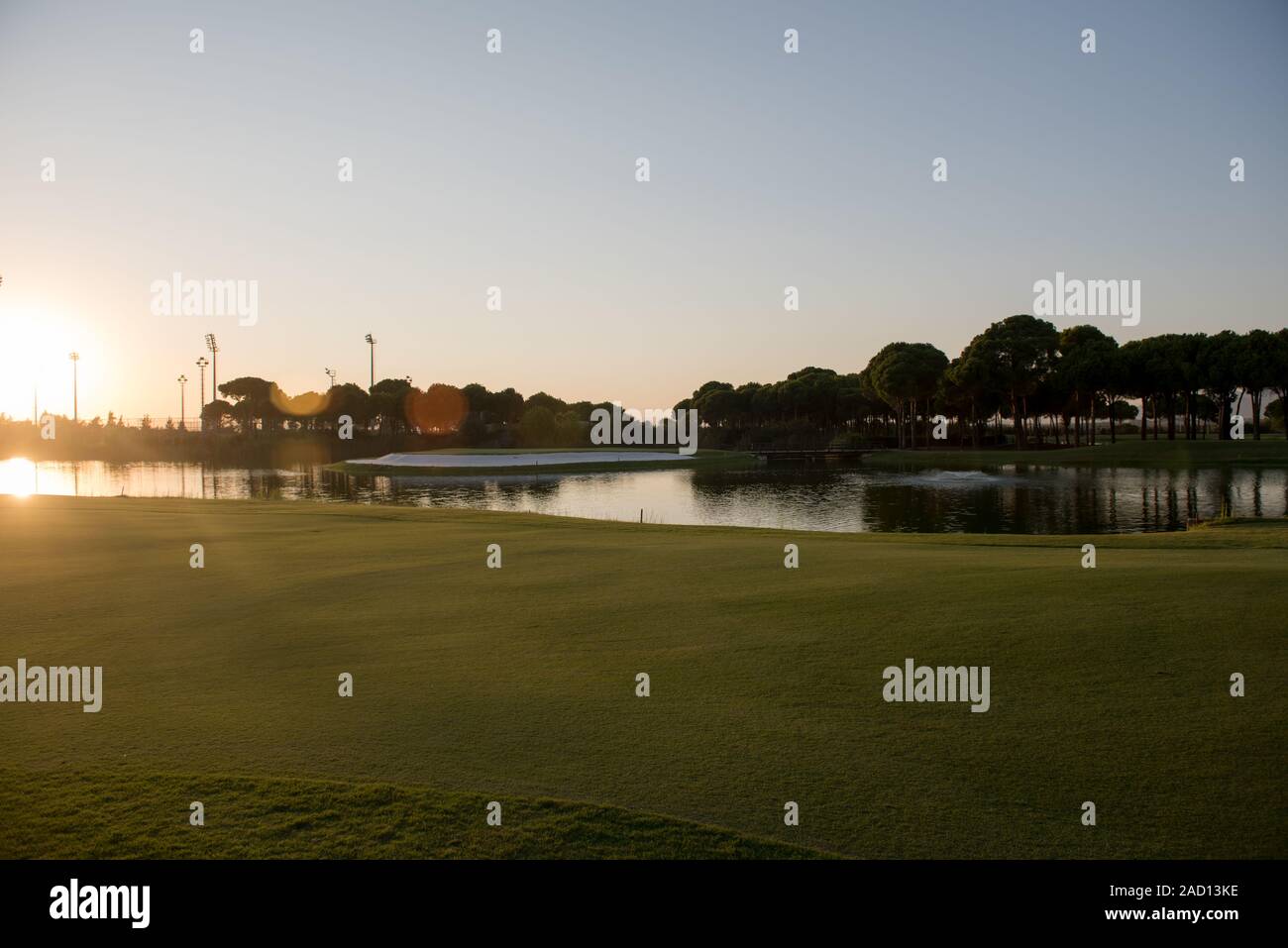 golf course on sunset Stock Photo - Alamy