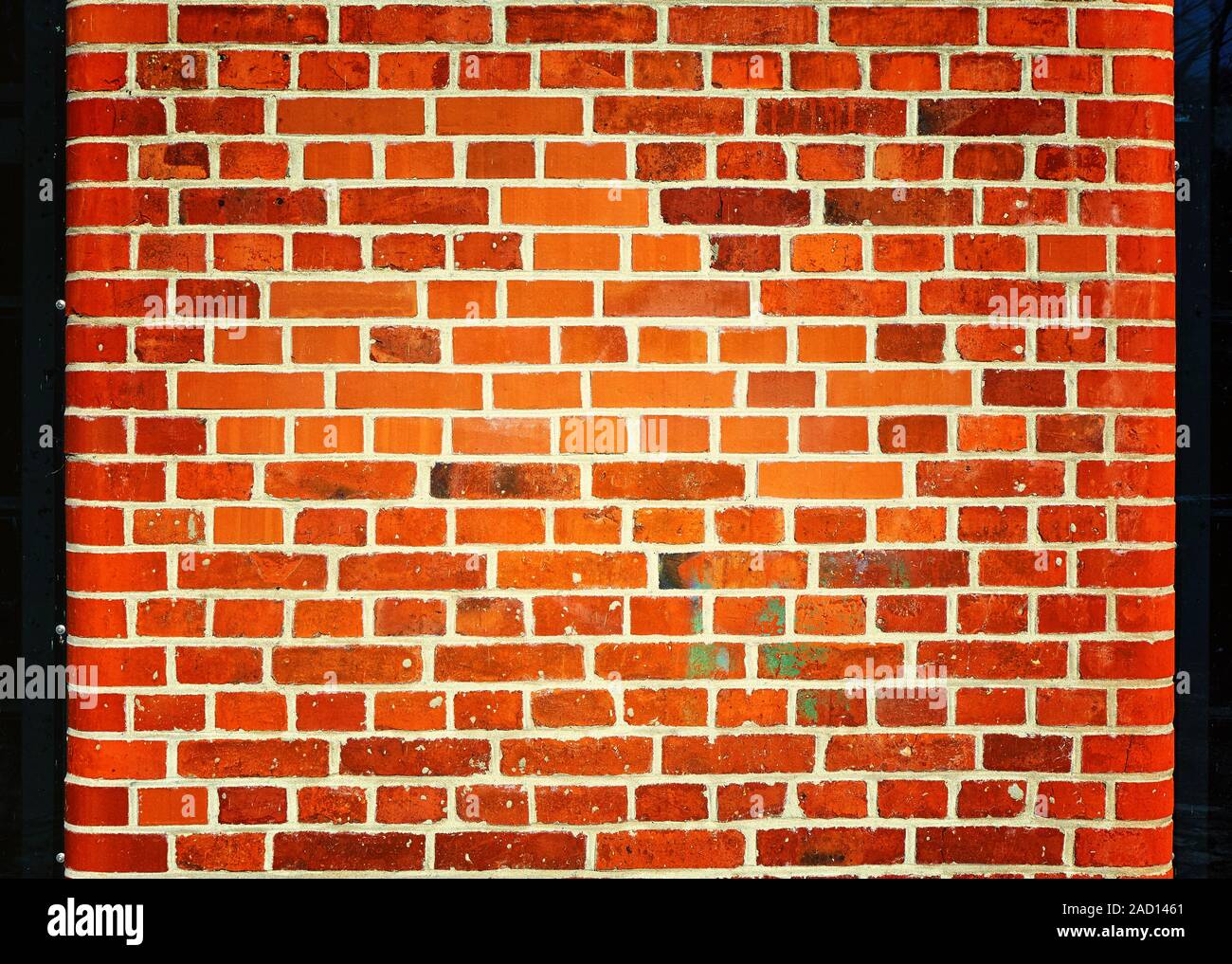 Brick wall with rounded edges as background Stock Photo - Alamy