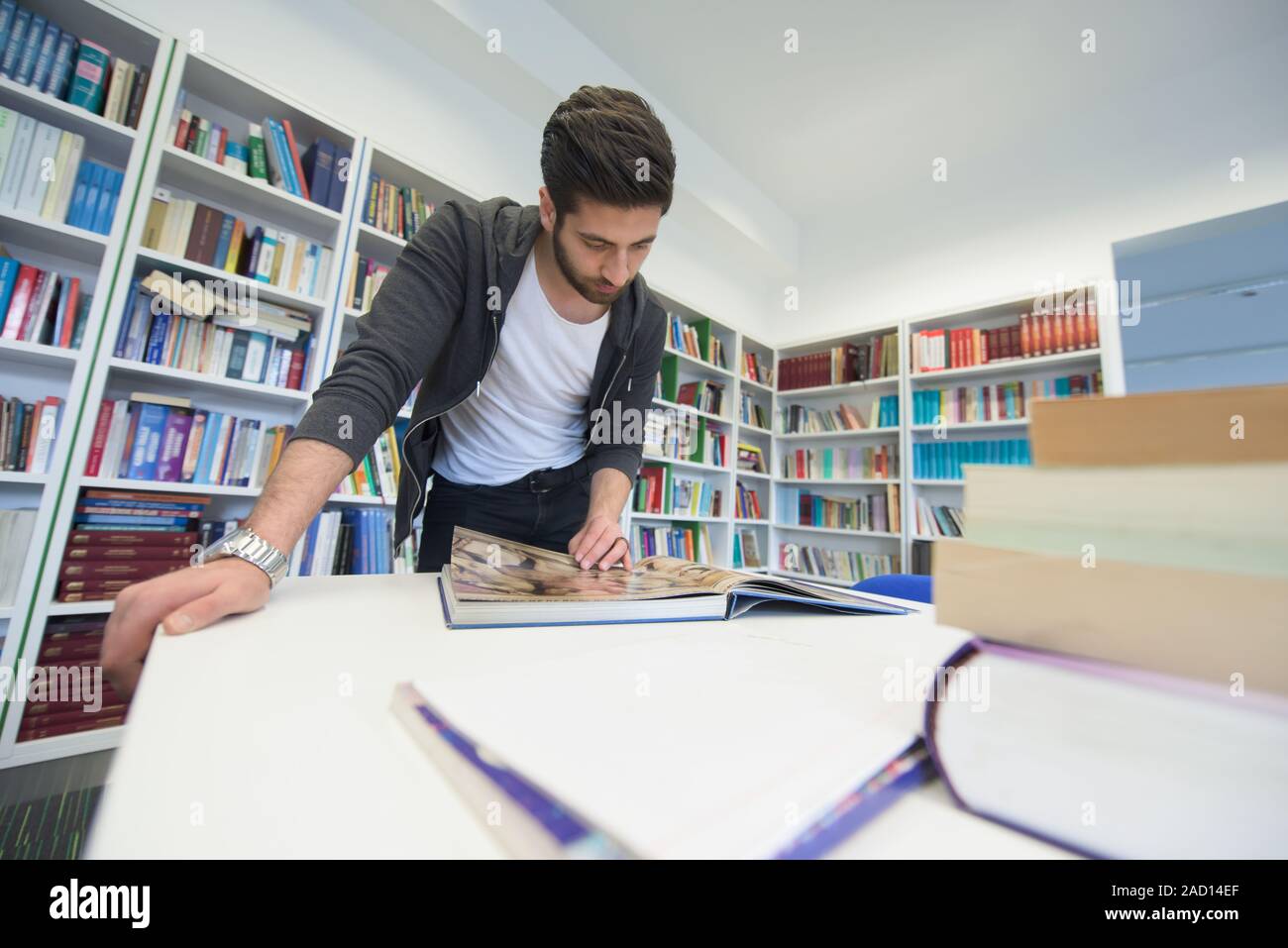 student study in school library Stock Photo - Alamy