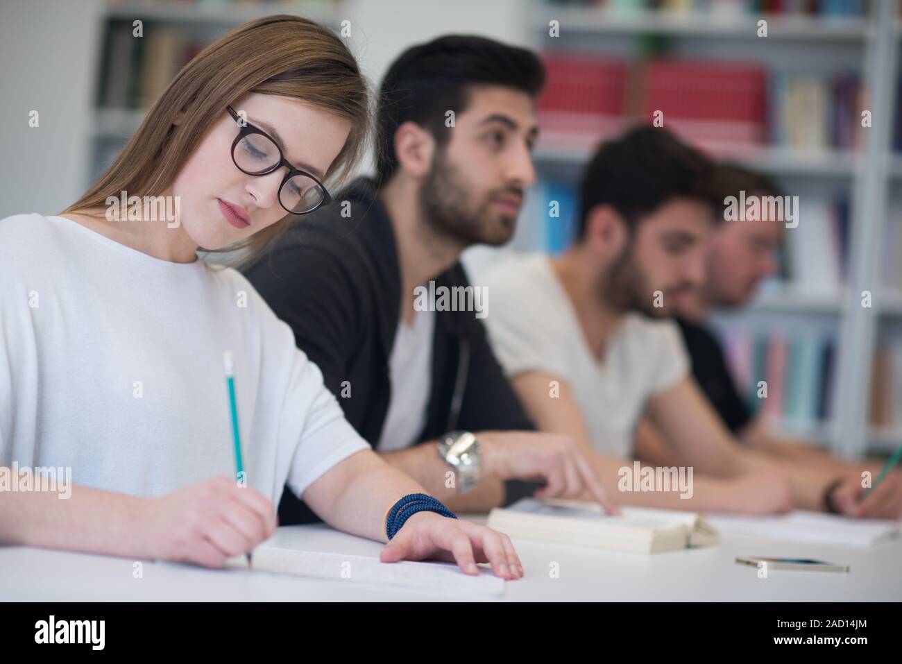 group of students study together in classroom Stock Photo - Alamy