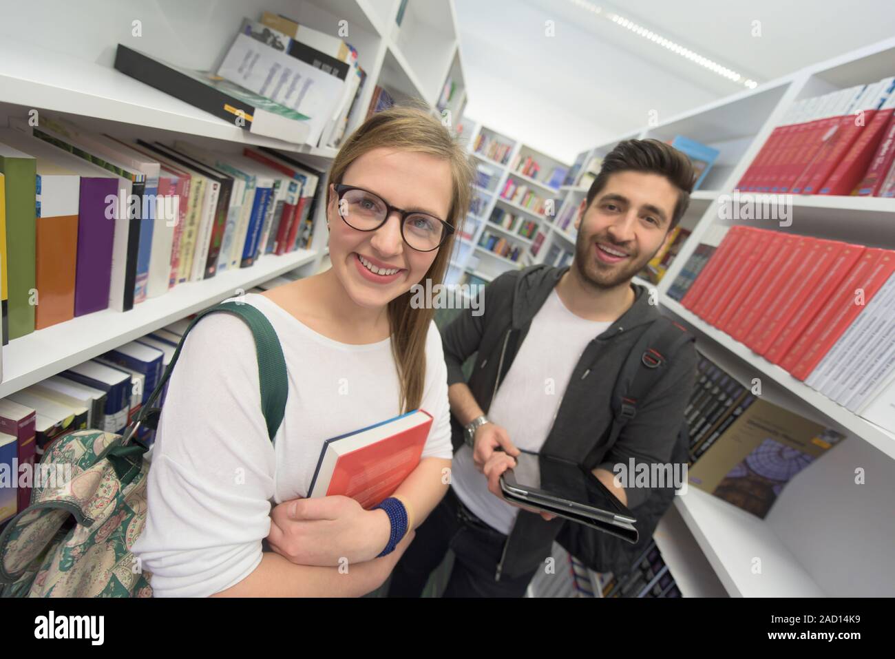 students group in school library Stock Photo - Alamy