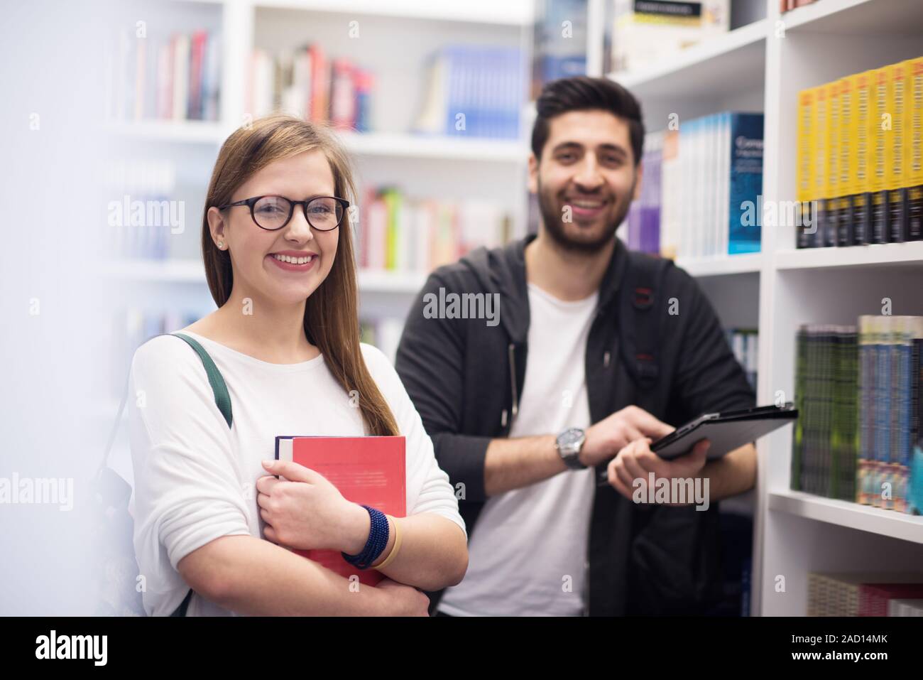 students group in school library Stock Photo - Alamy