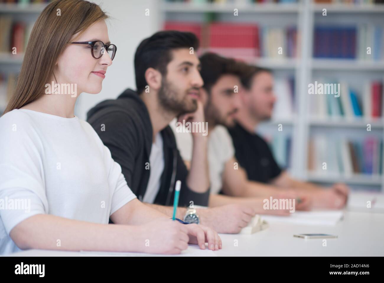 group of students study together in classroom Stock Photo - Alamy