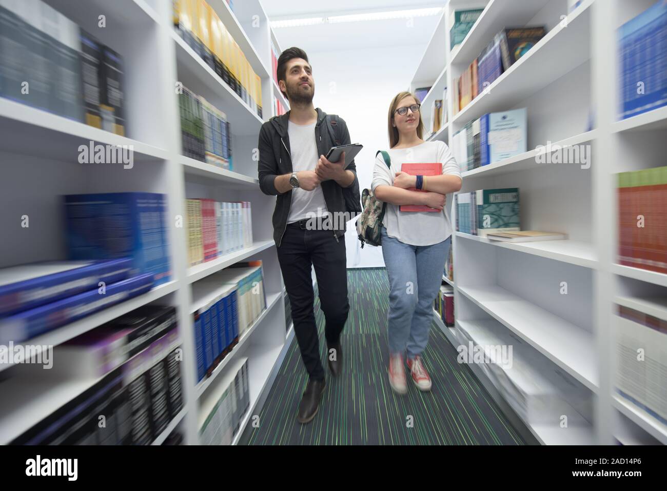 students group in school library Stock Photo - Alamy