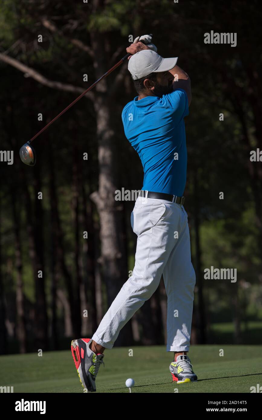 golf player hitting shot Stock Photo - Alamy
