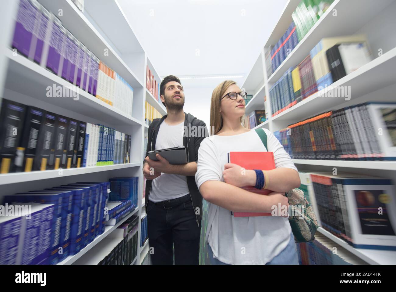 students group in school library Stock Photo - Alamy
