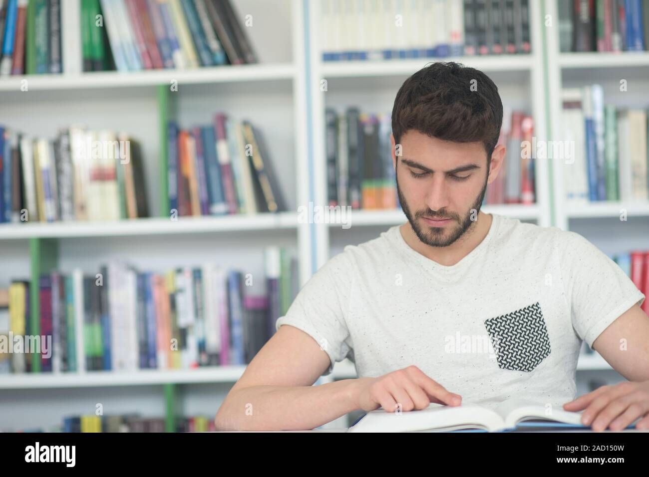 student study in school library Stock Photo - Alamy
