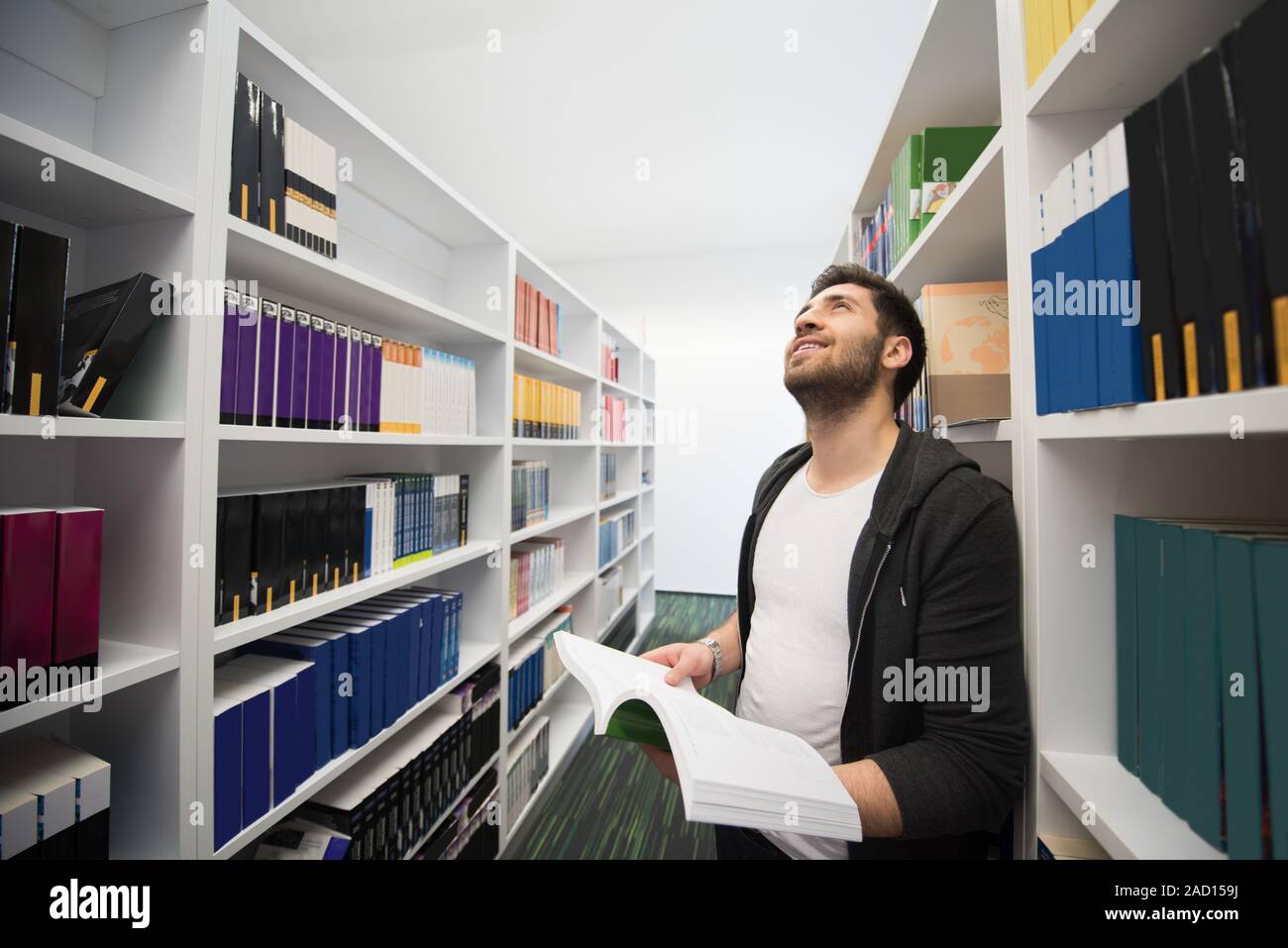 student study in school library Stock Photo - Alamy