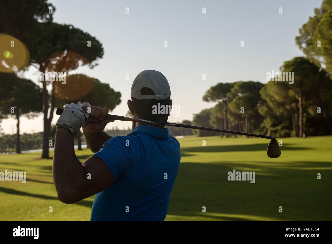 golf player hitting shot Stock Photo - Alamy