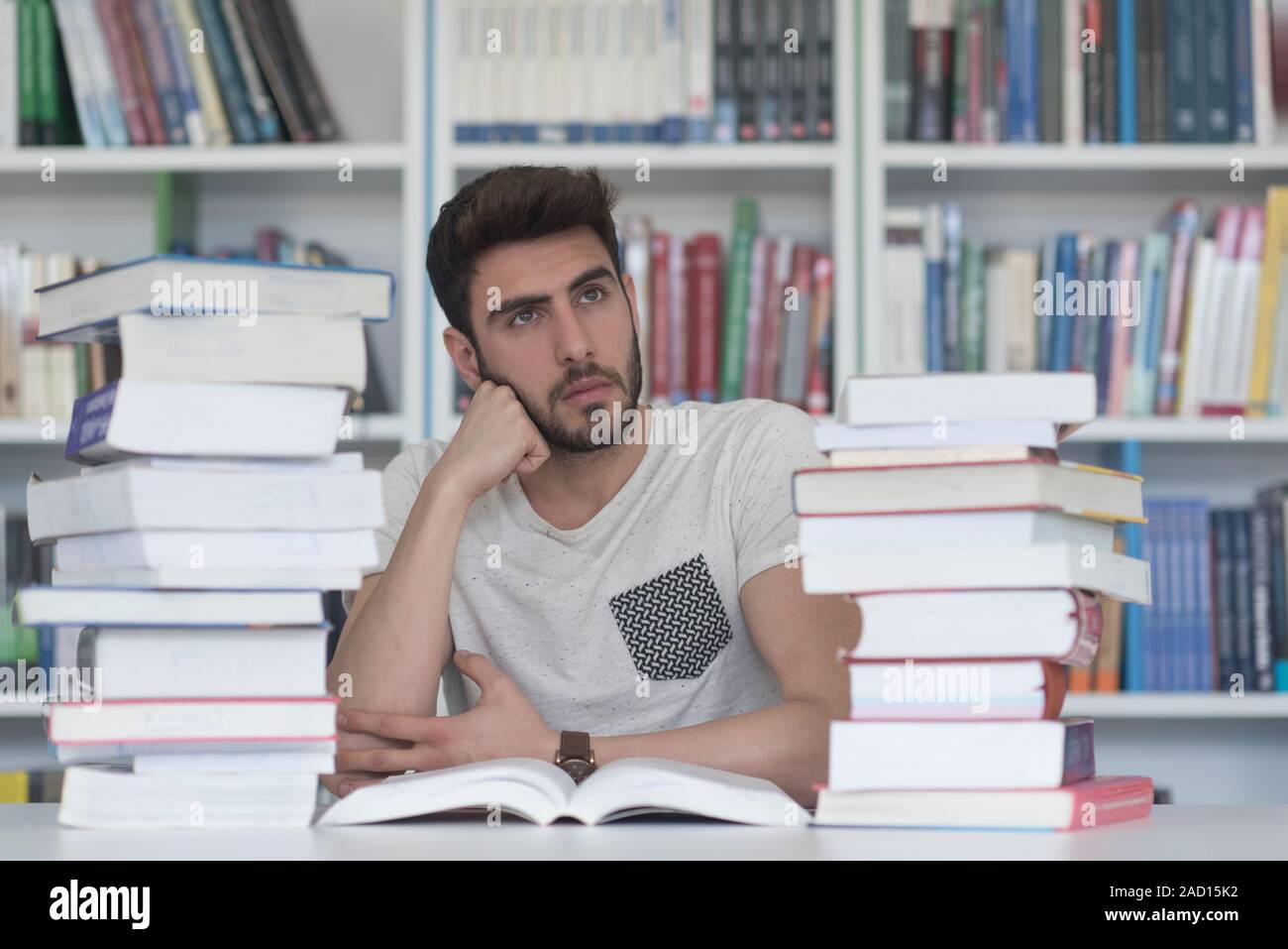 student study in school library Stock Photo - Alamy