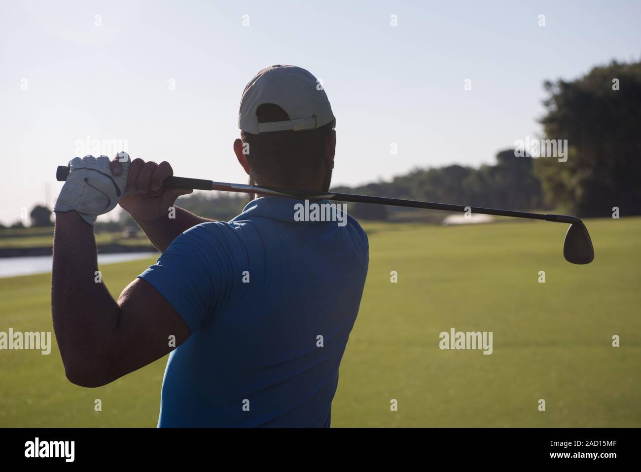 golf player hitting shot Stock Photo - Alamy