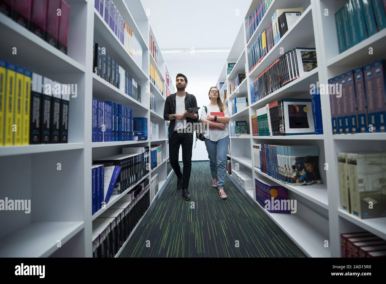 students group in school library Stock Photo - Alamy