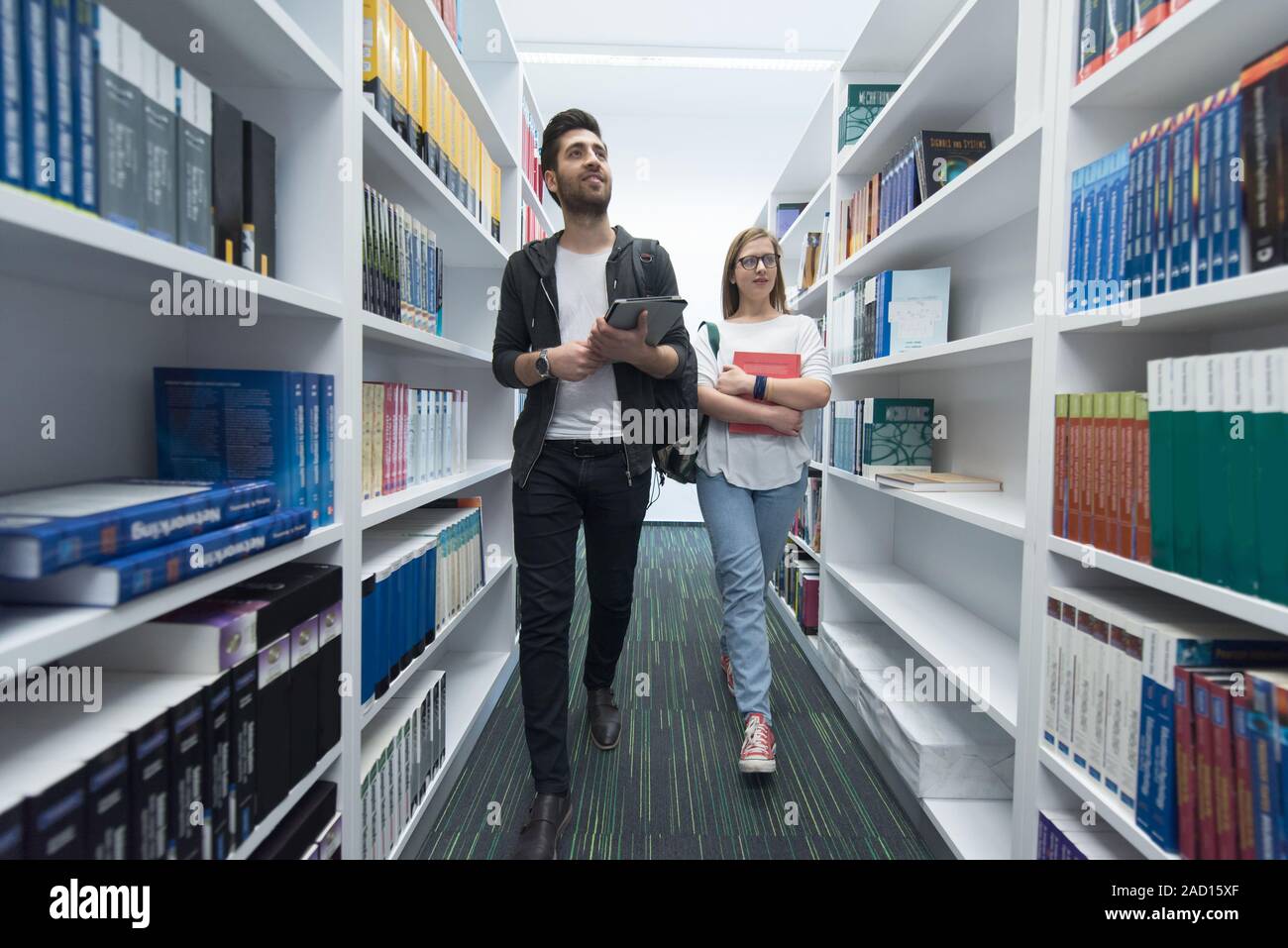 students group in school library Stock Photo - Alamy