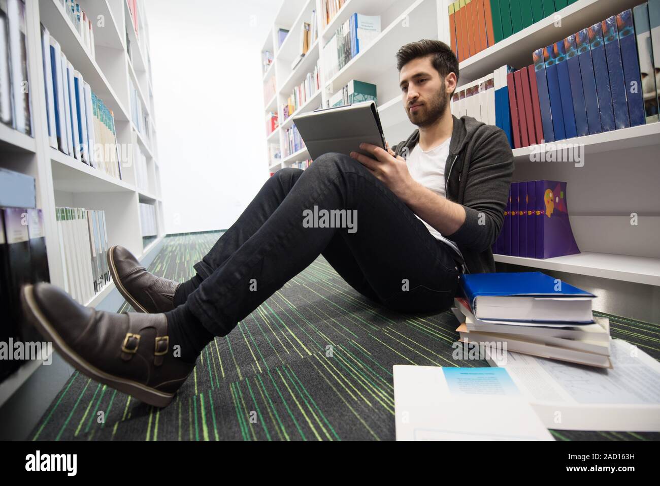 student study in school library Stock Photo - Alamy