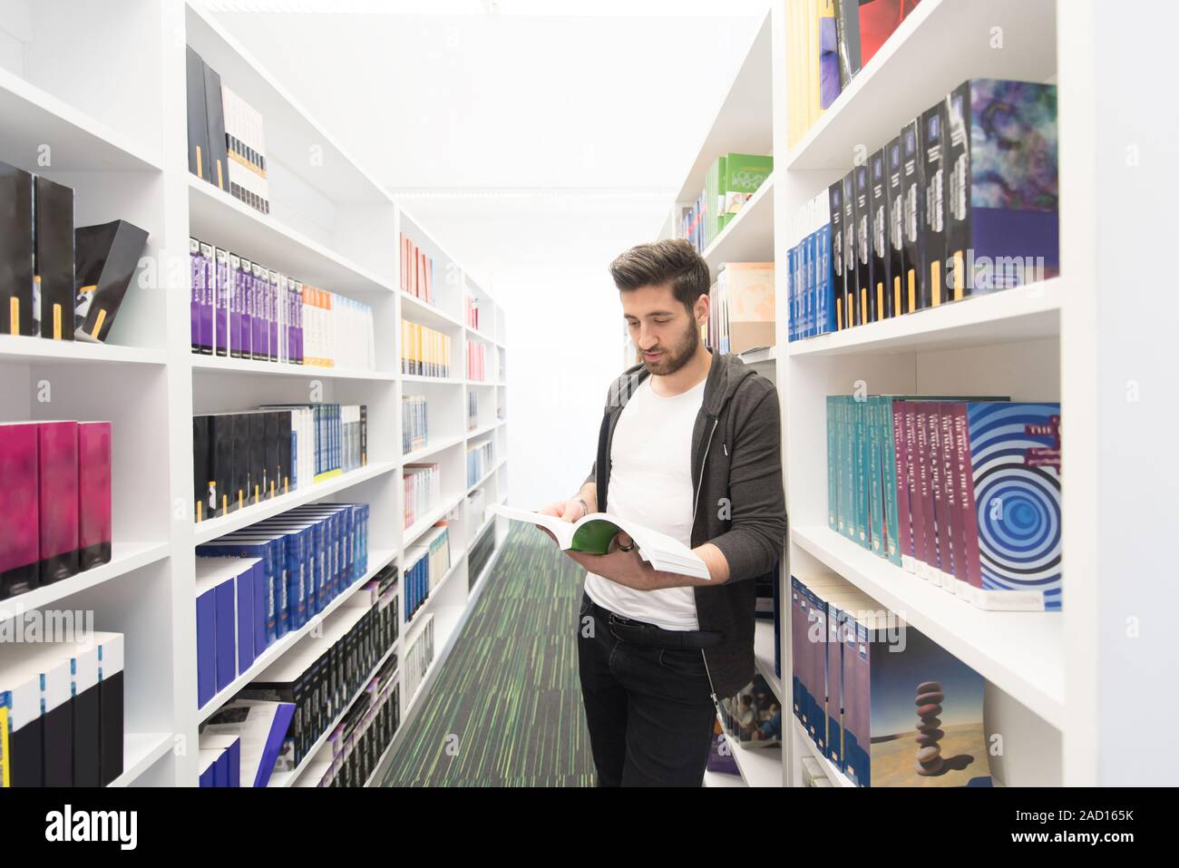 student study in school library Stock Photo - Alamy