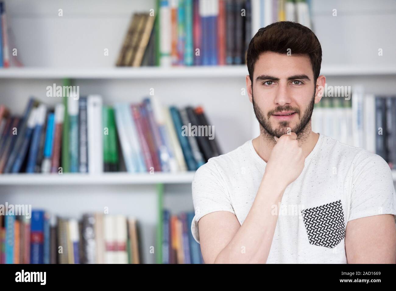 student study in school library Stock Photo - Alamy