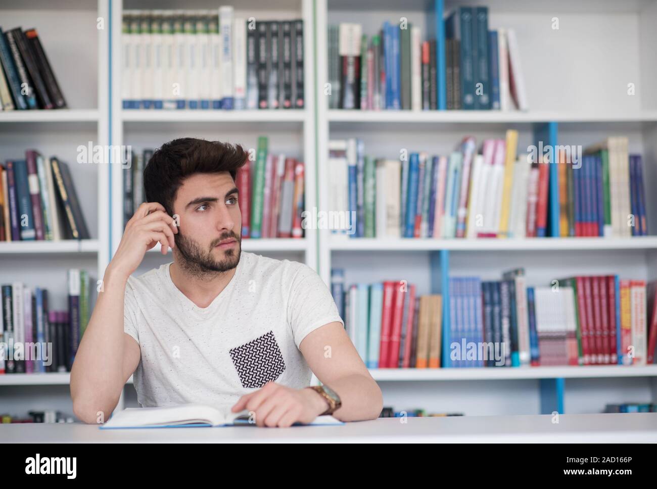 student study in school library Stock Photo - Alamy