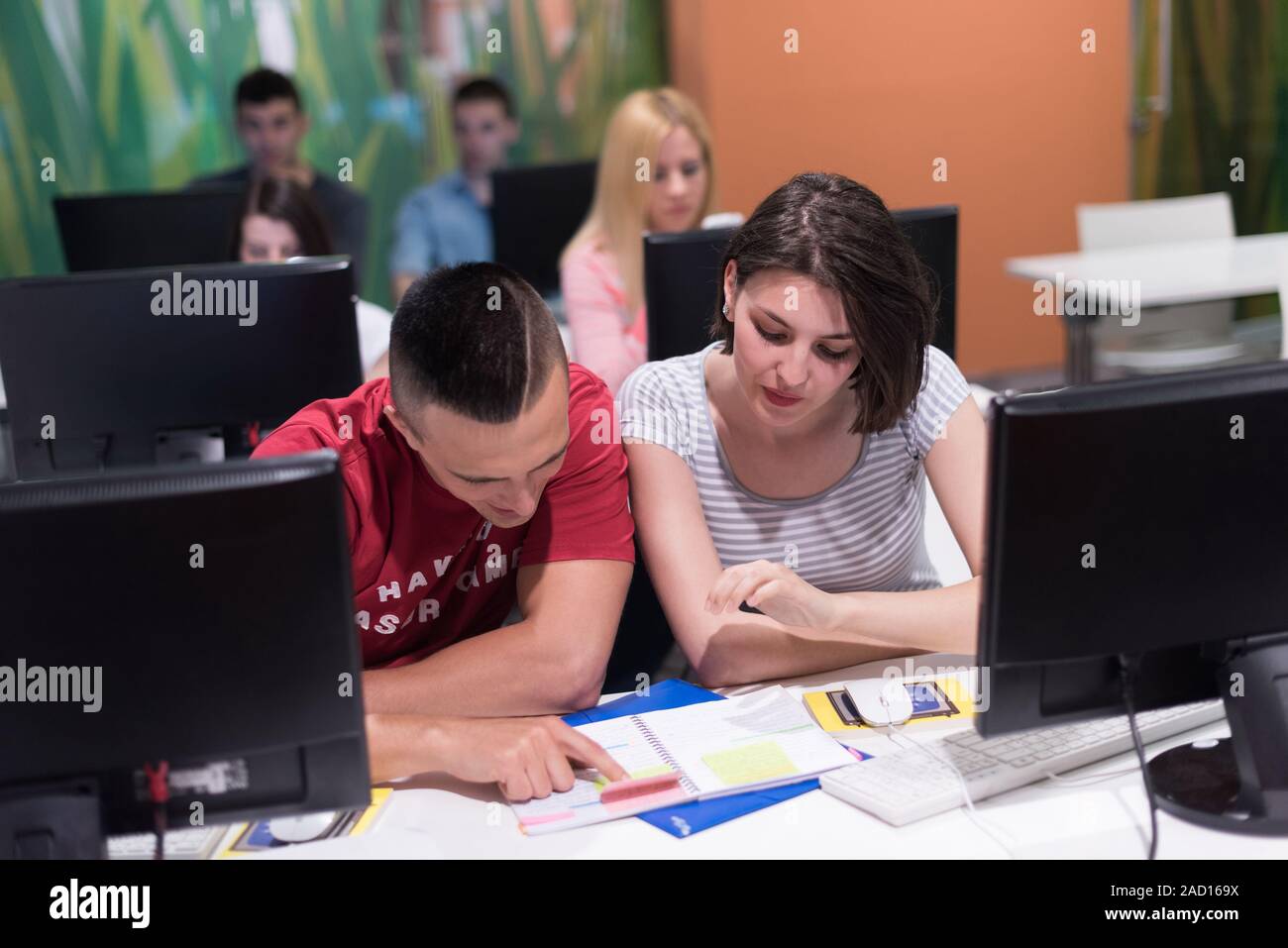 technology students group working in computer lab school classroom ...