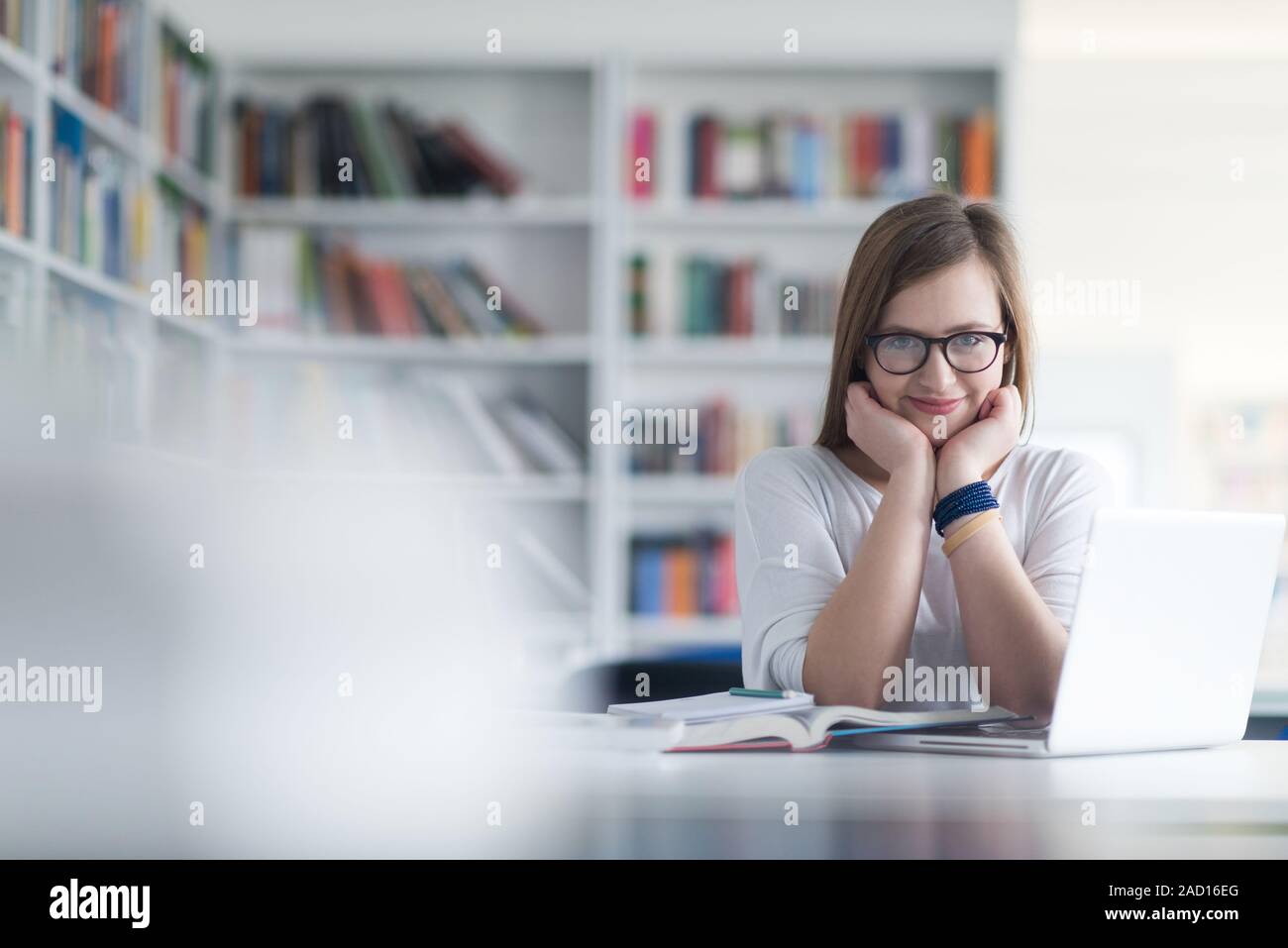 female student study in school library Stock Photo - Alamy
