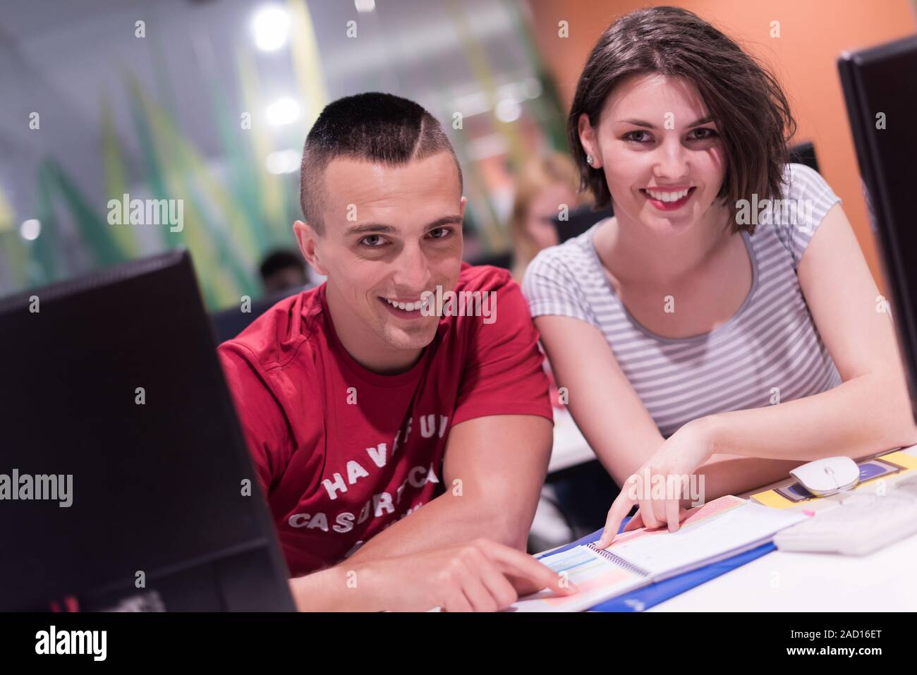 technology students group working in computer lab school classroom ...