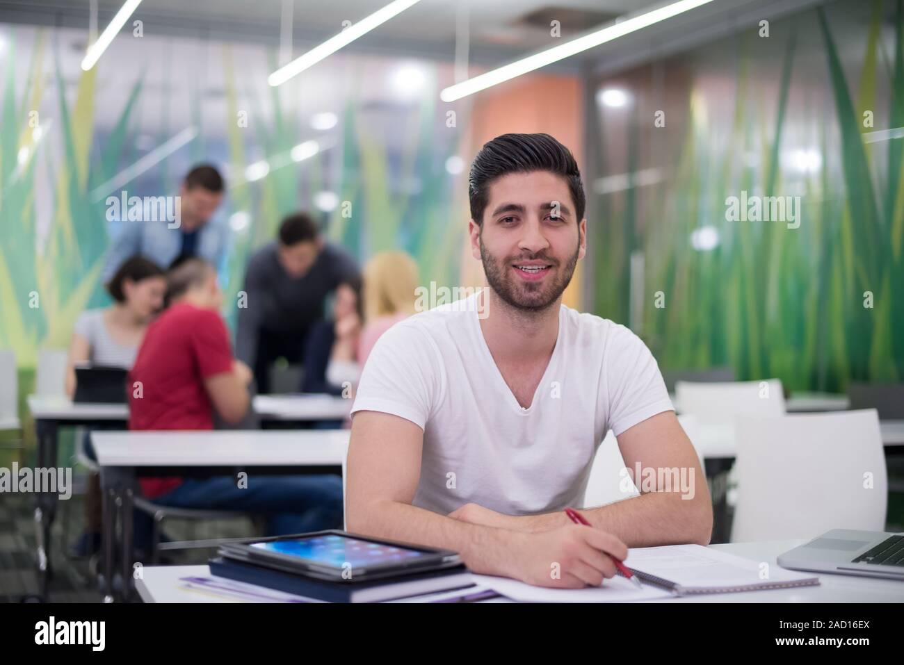 male student in classroom Stock Photo - Alamy