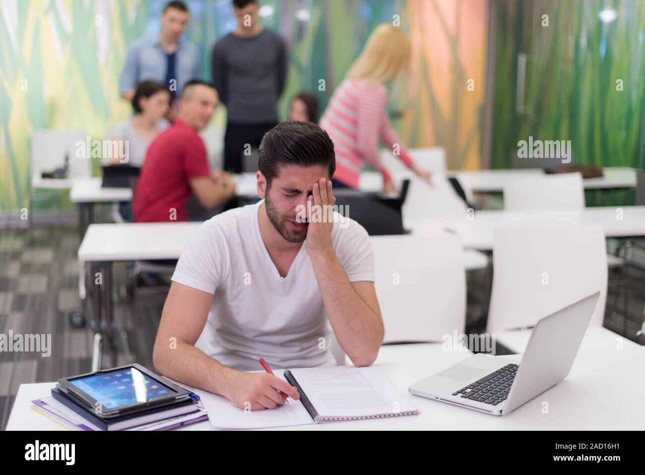 male student in classroom Stock Photo - Alamy