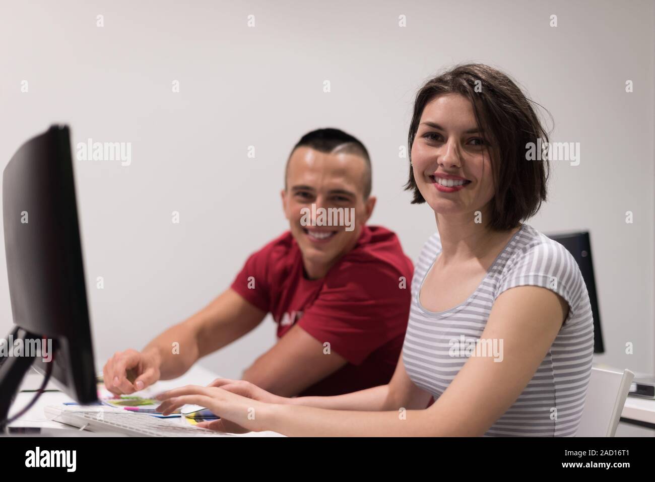 technology students group working in computer lab school classroom Stock Photo - Alamy