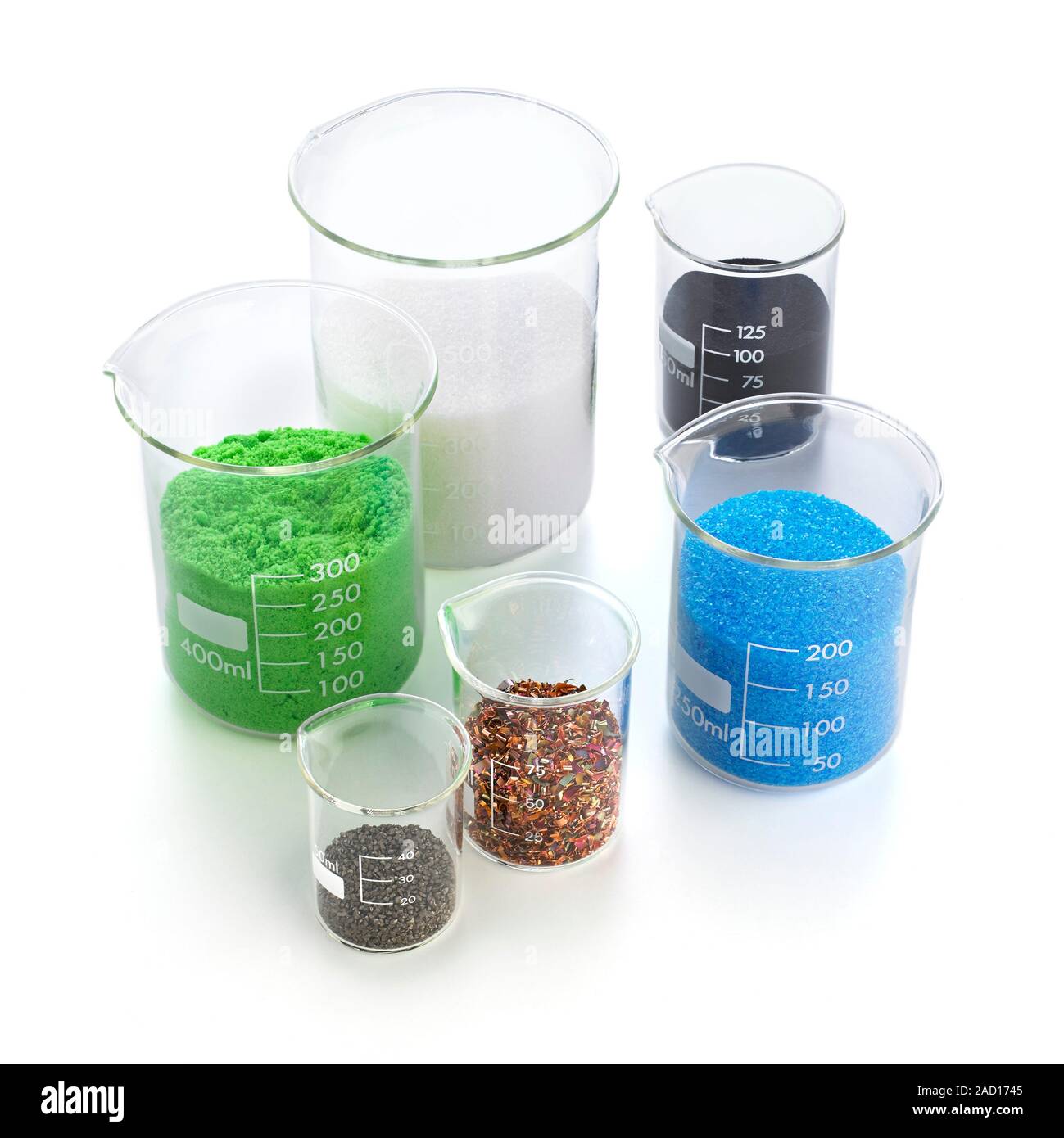 Moles. A collection of beakers, each containing one mole of a substance ...