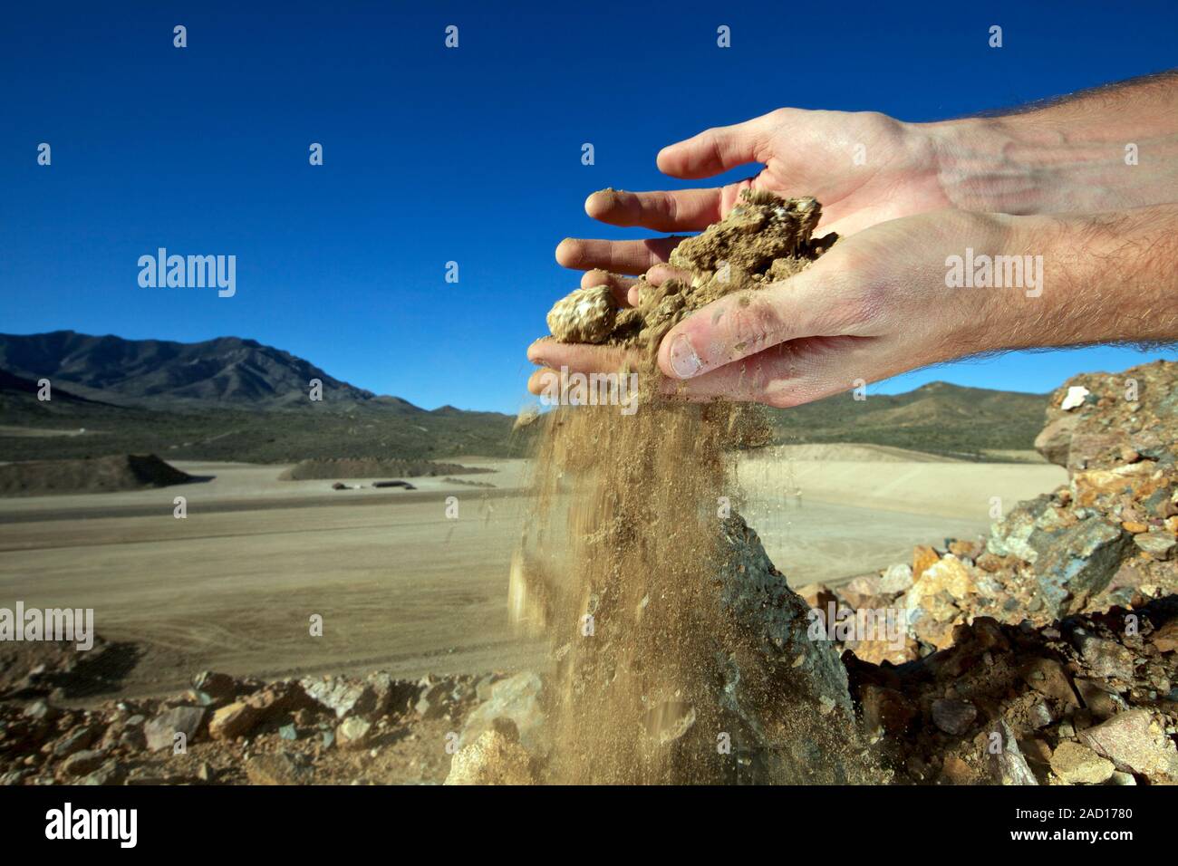 Rare earth ore. Handful of ore mined at the Mountain Pass rare earth ...