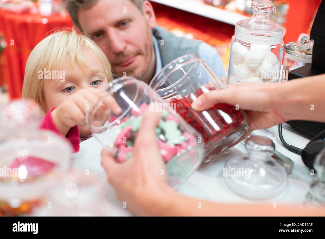 Child sorting sweets hi-res stock photography and images - Alamy
