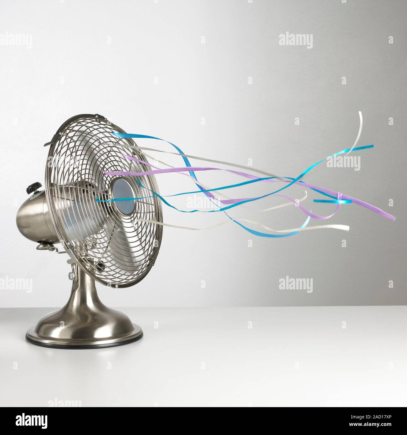A domestic fan, with ribbons showing the movement of air Stock Photo ...