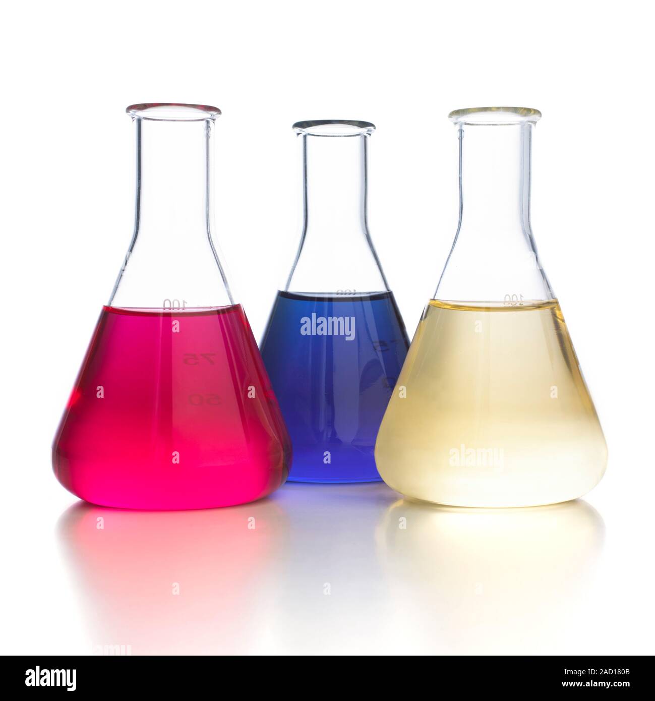 Natural pH indicator. Three flasks containing chemicals of different pH ...