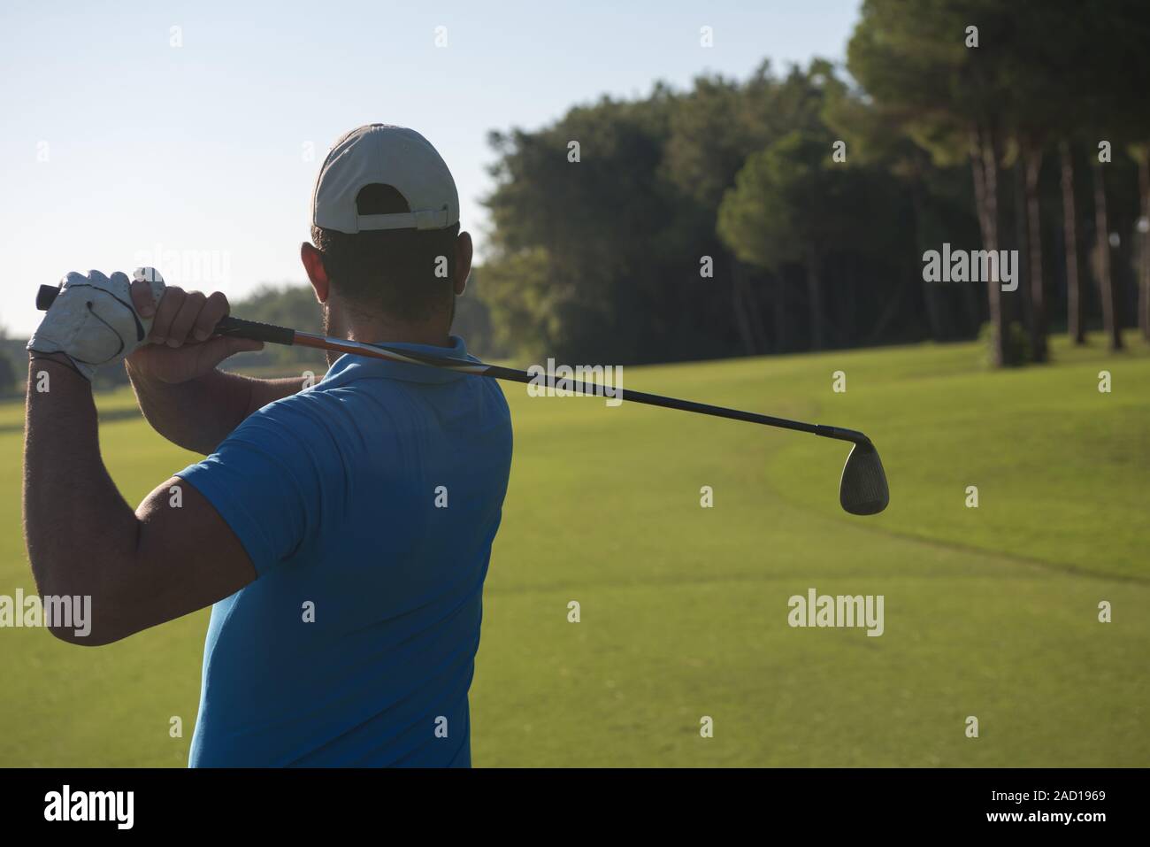 golf player hitting shot Stock Photo - Alamy