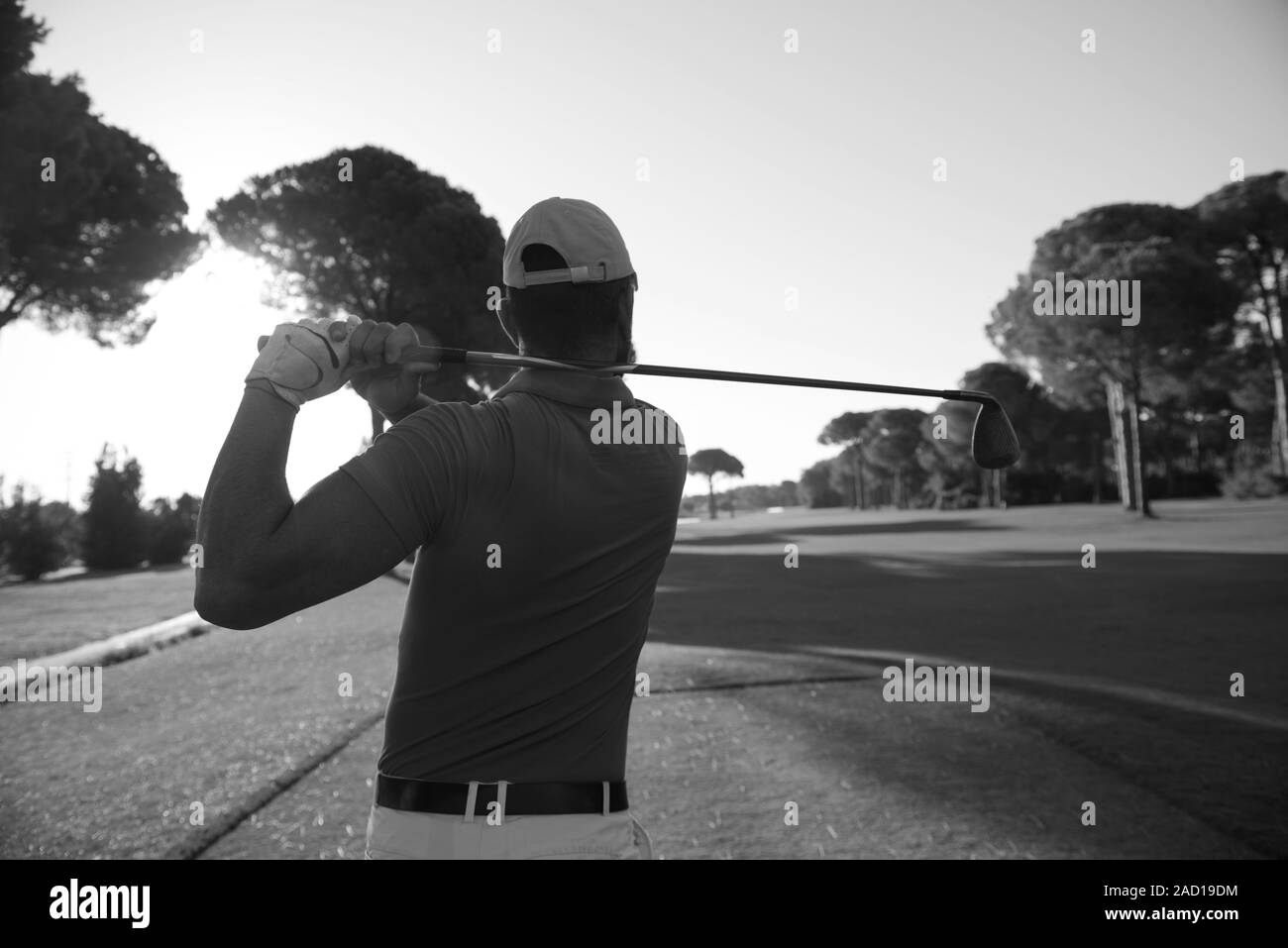 golf player hitting shot Stock Photo - Alamy