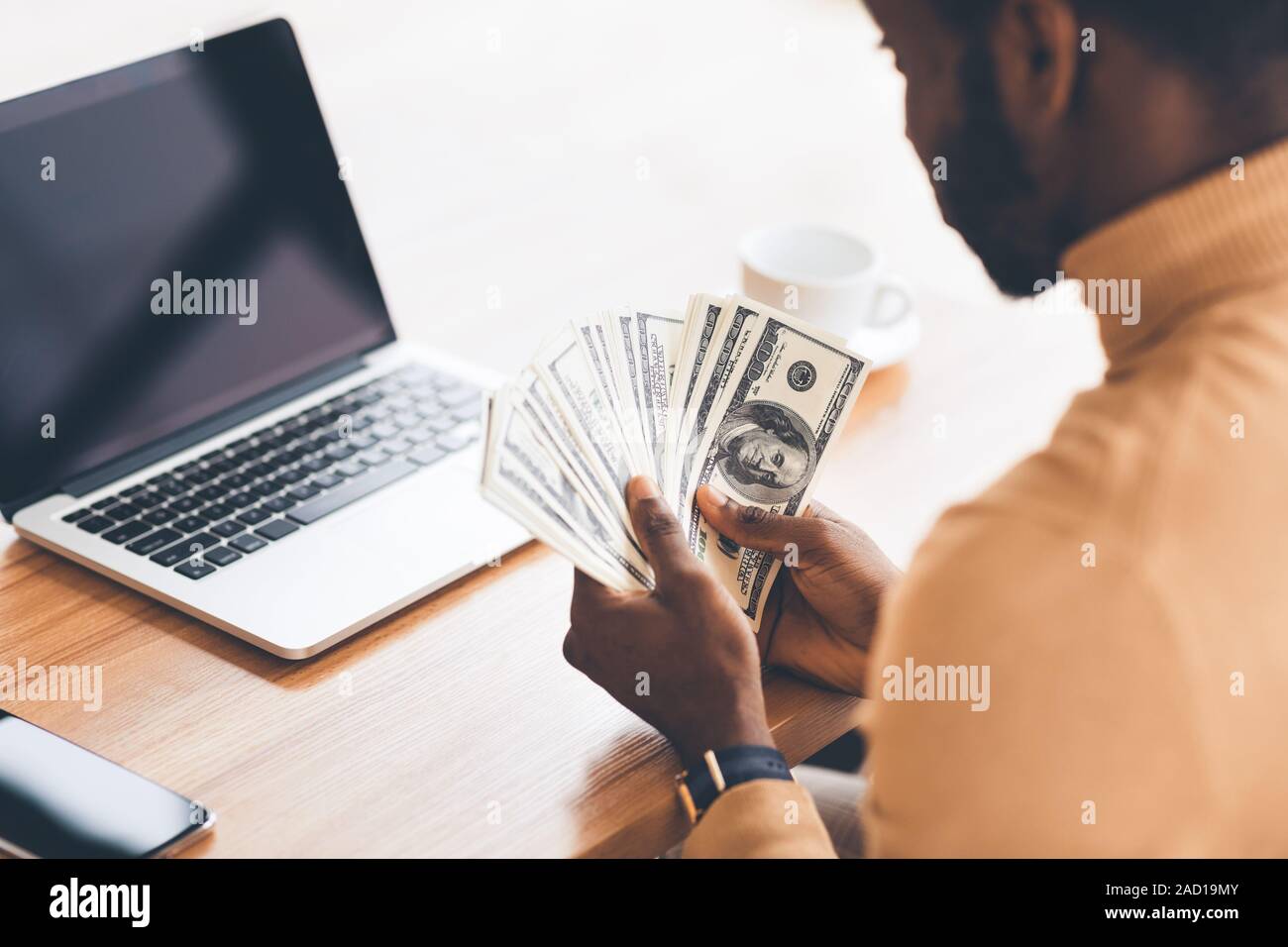 African american man usd cash hi-res stock photography and images - Alamy