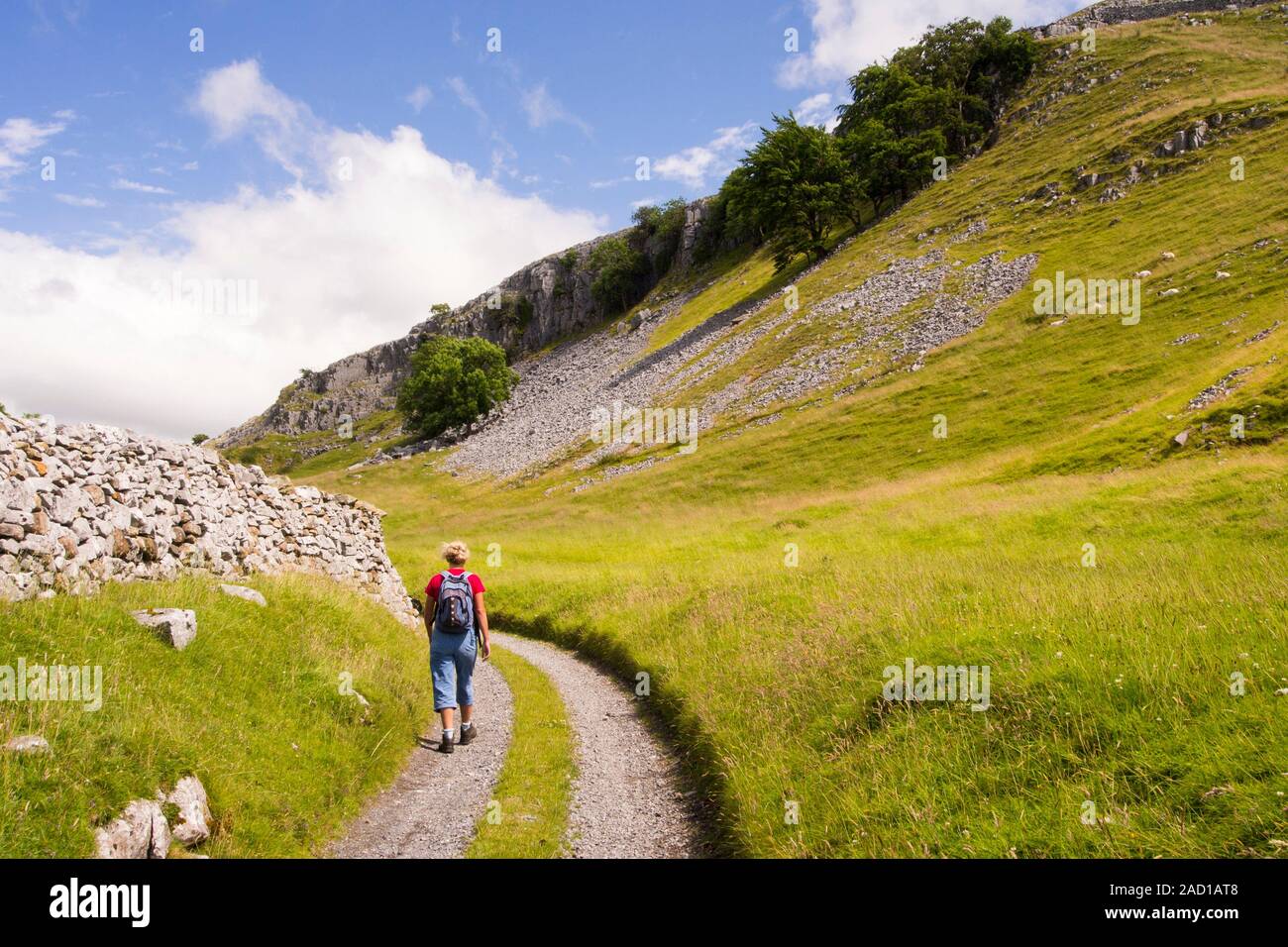 A Bridleway at Feizor in the Yorkshire Dales, UK, with a middle aged ...