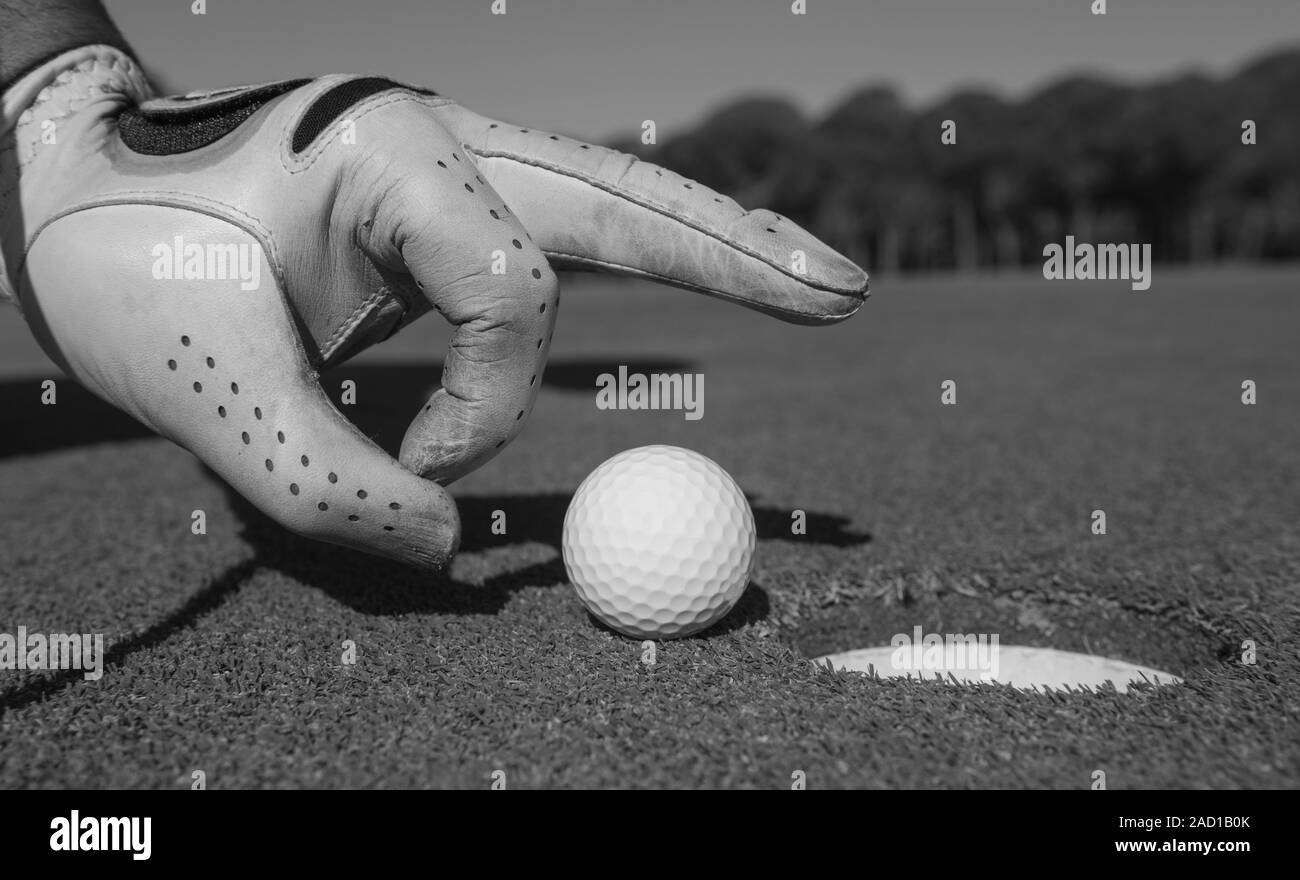 Golfer man hand golf Black and White Stock Photos & Images - Alamy