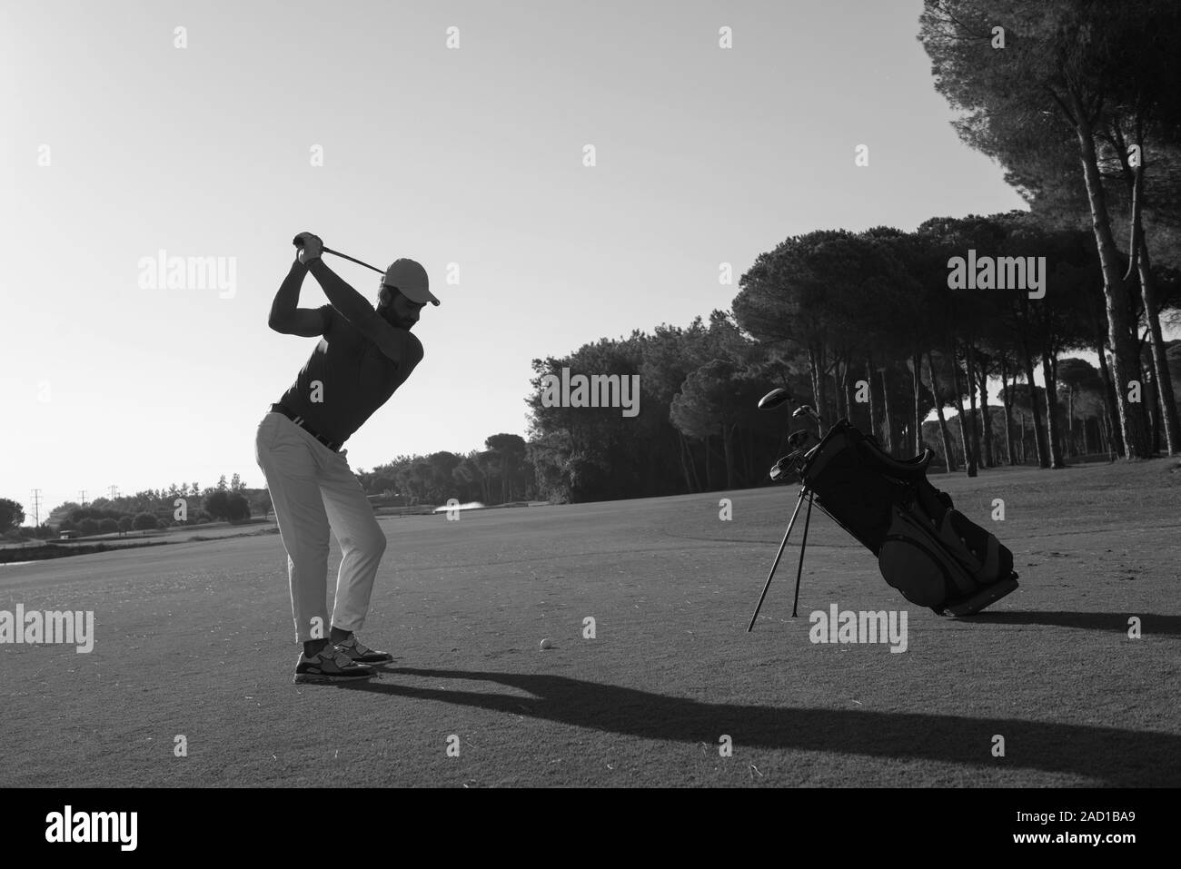Golf iron shot Black and White Stock Photos & Images - Alamy