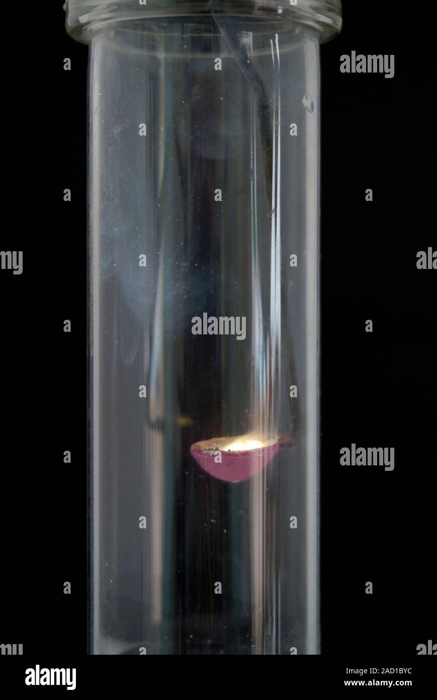 Burning zinc. Close-up of zinc being burnt in a gas cylinder. Zinc ...