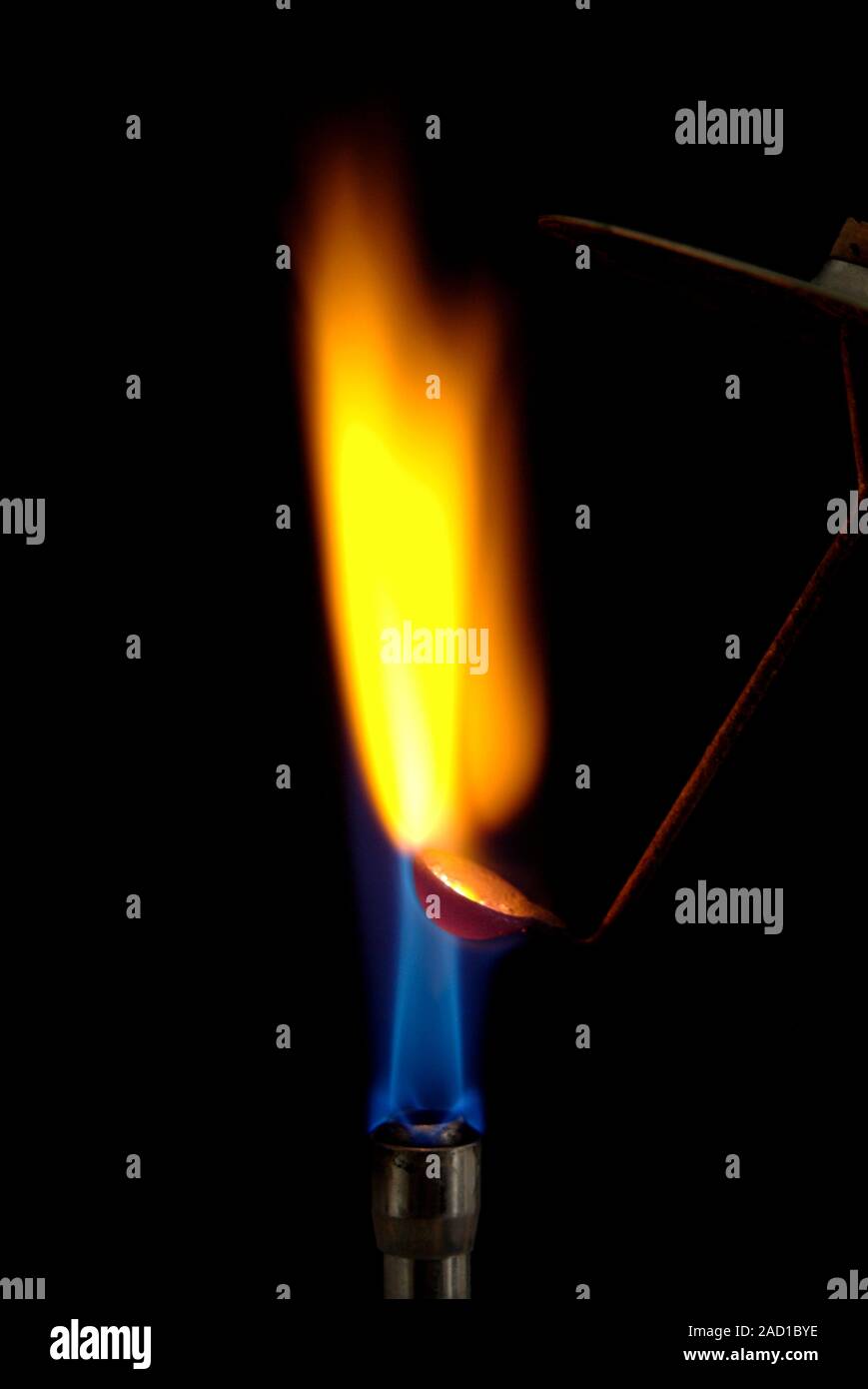 Burning lithium. Close-up of lithium being burnt in a flame from a ...