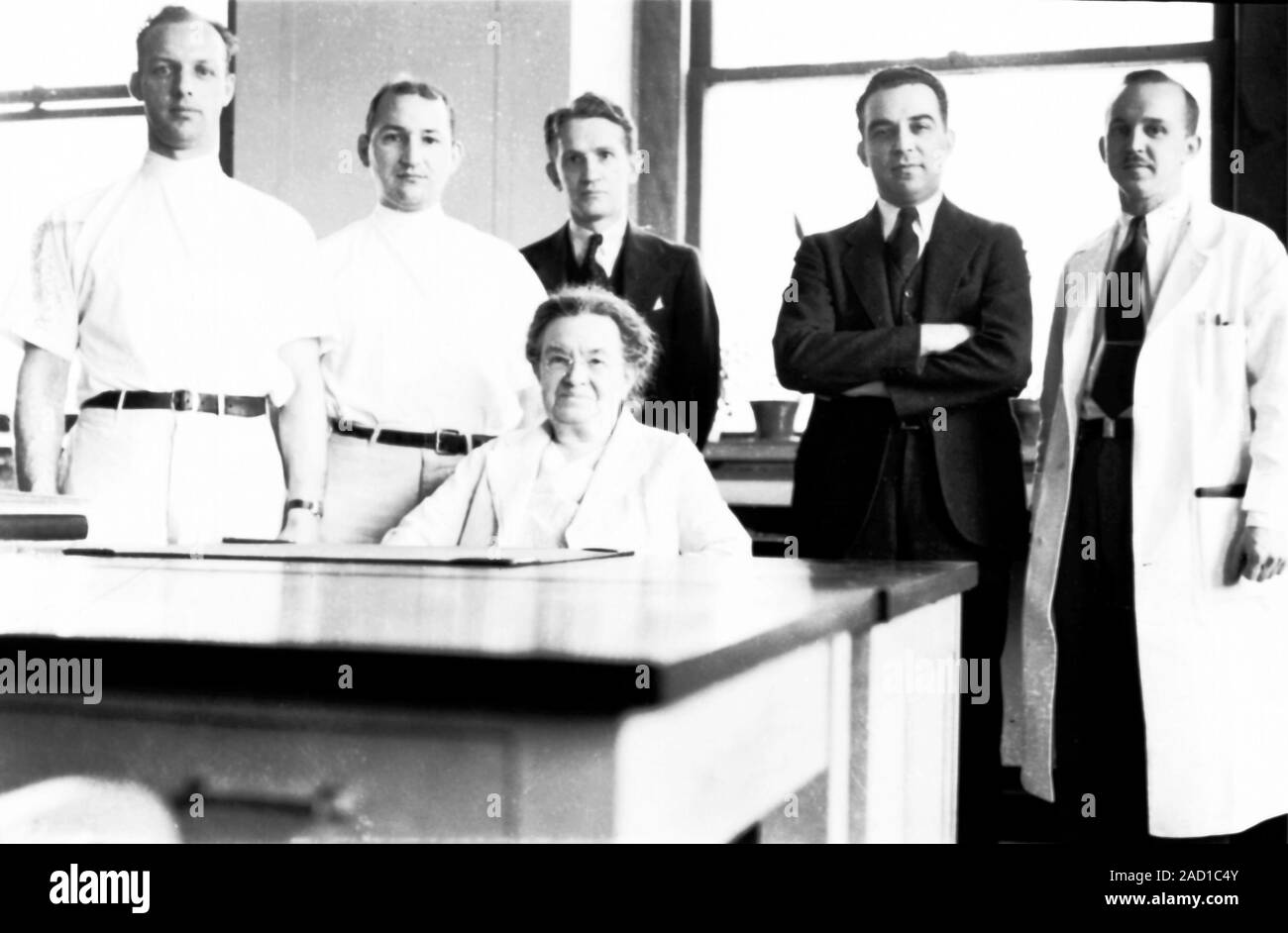 Florence Sabin (1871-1953, centre), US medical researcher, seated at a ...