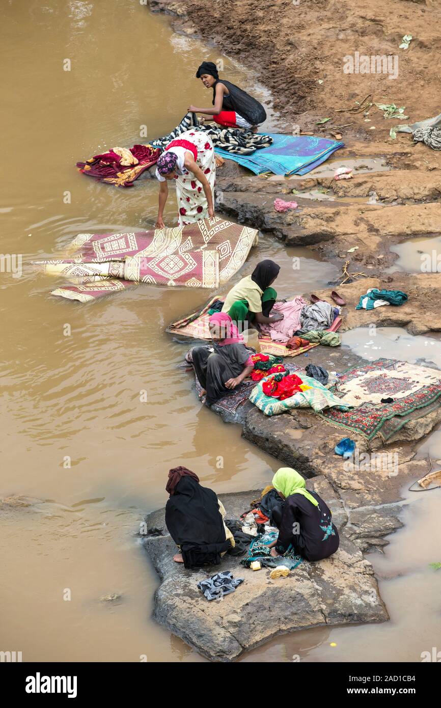 Ethiopian river scene showing women doing the daily washing in a river ...