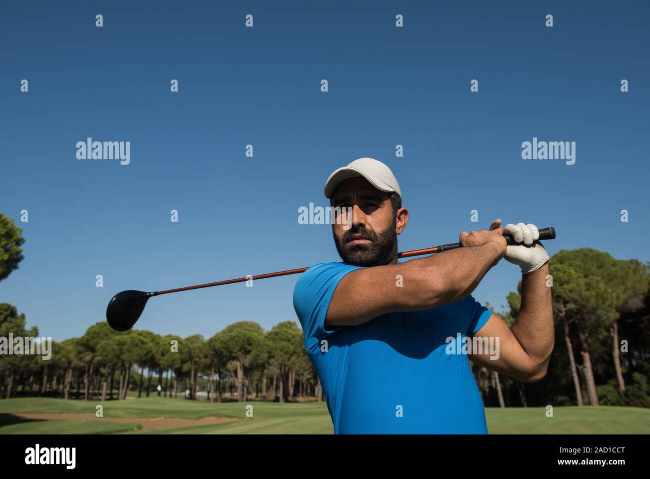 golf player hitting shot Stock Photo - Alamy