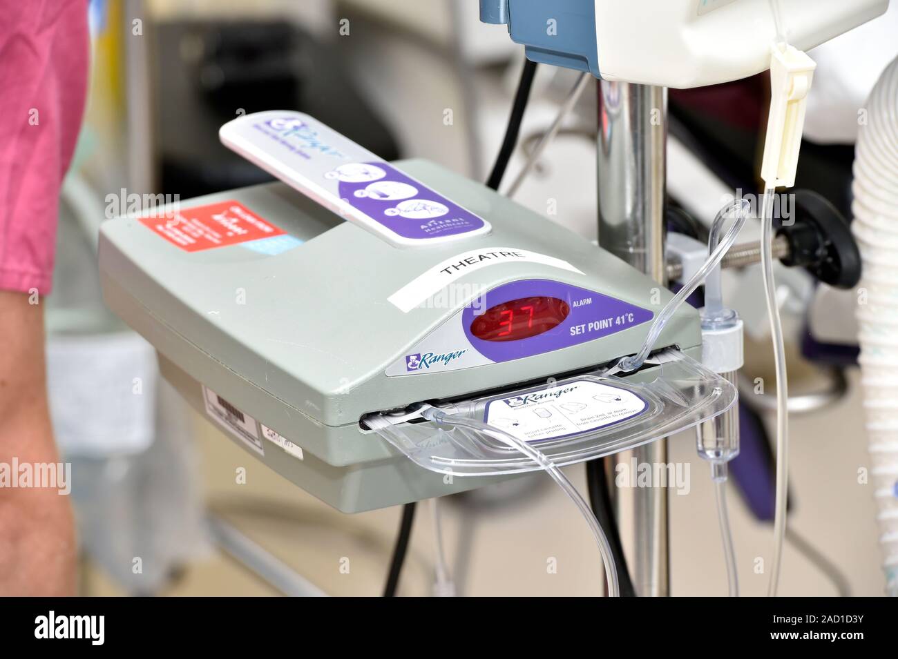 Surgical fluid-warming device. This device is used to warm fluids to ...